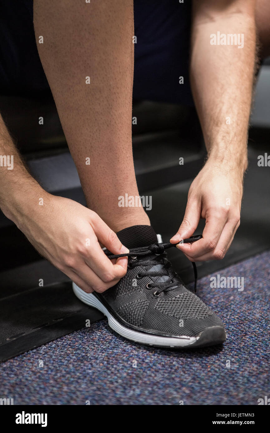 Man tying up lace hi-res stock photography and images - Alamy