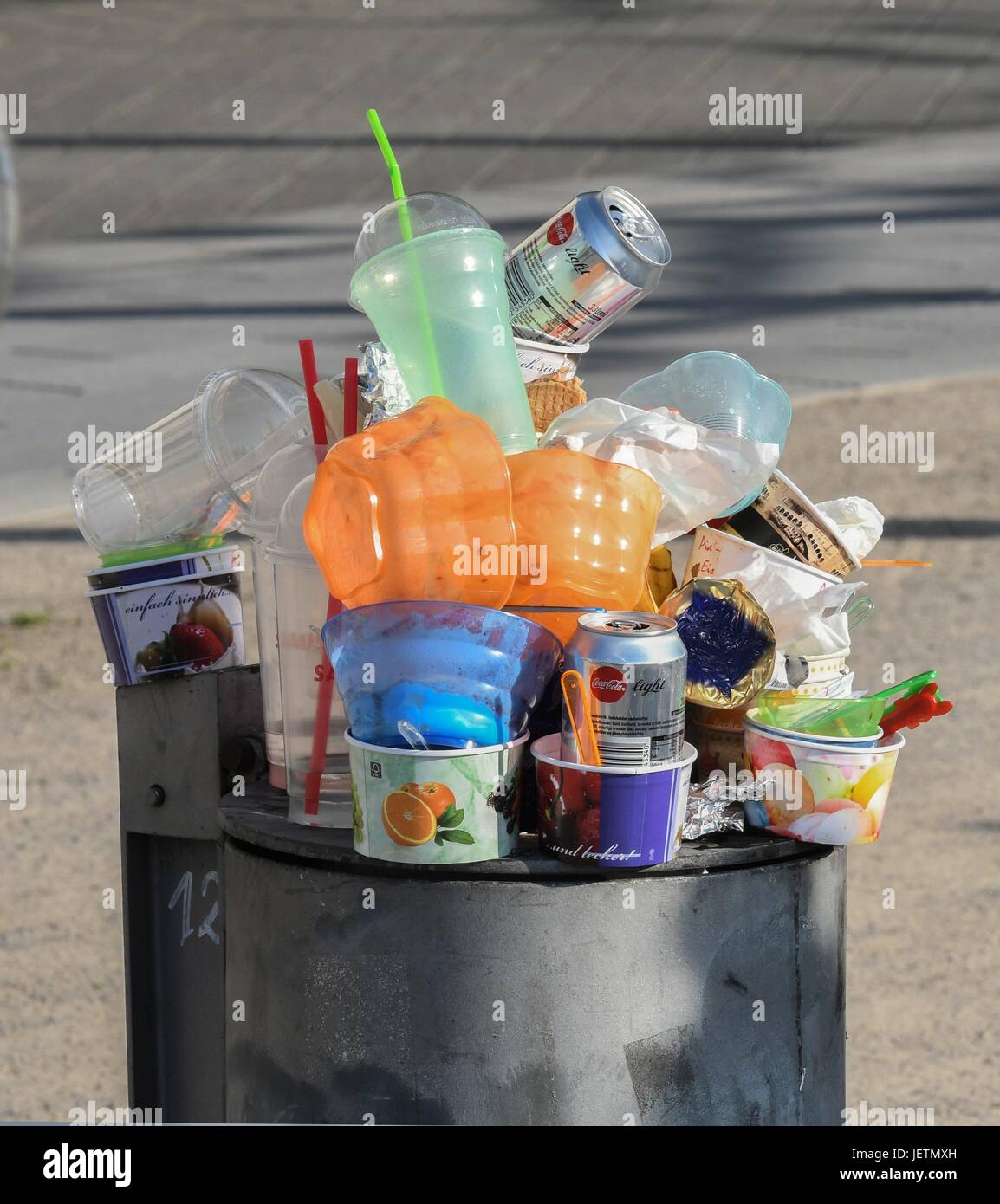 An overfull dustbin hi-res stock photography and images - Alamy
