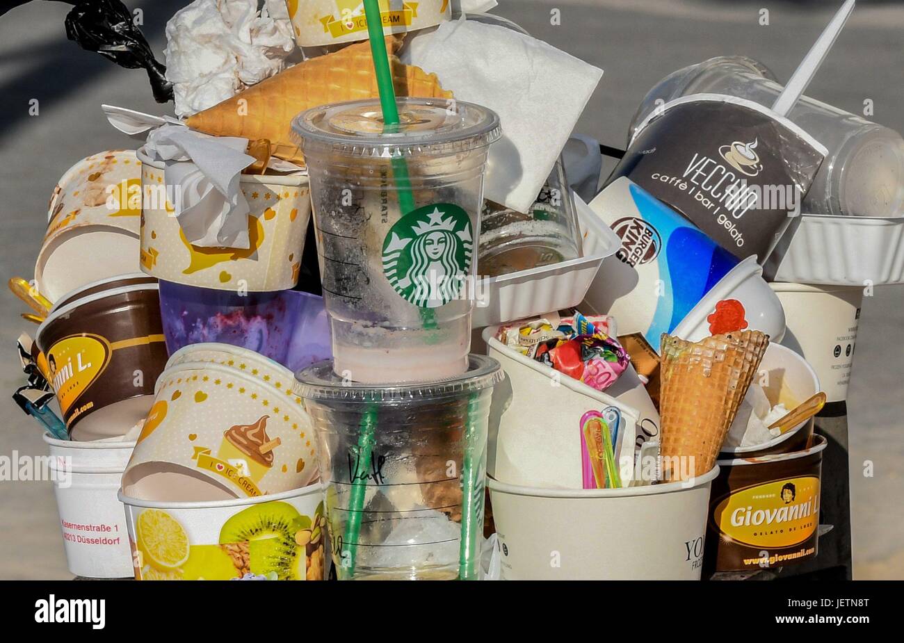 An overfull dustbin hi-res stock photography and images - Alamy