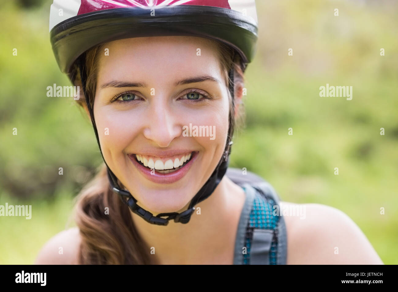 Woman wearing a helmet hi-res stock photography and images - Alamy