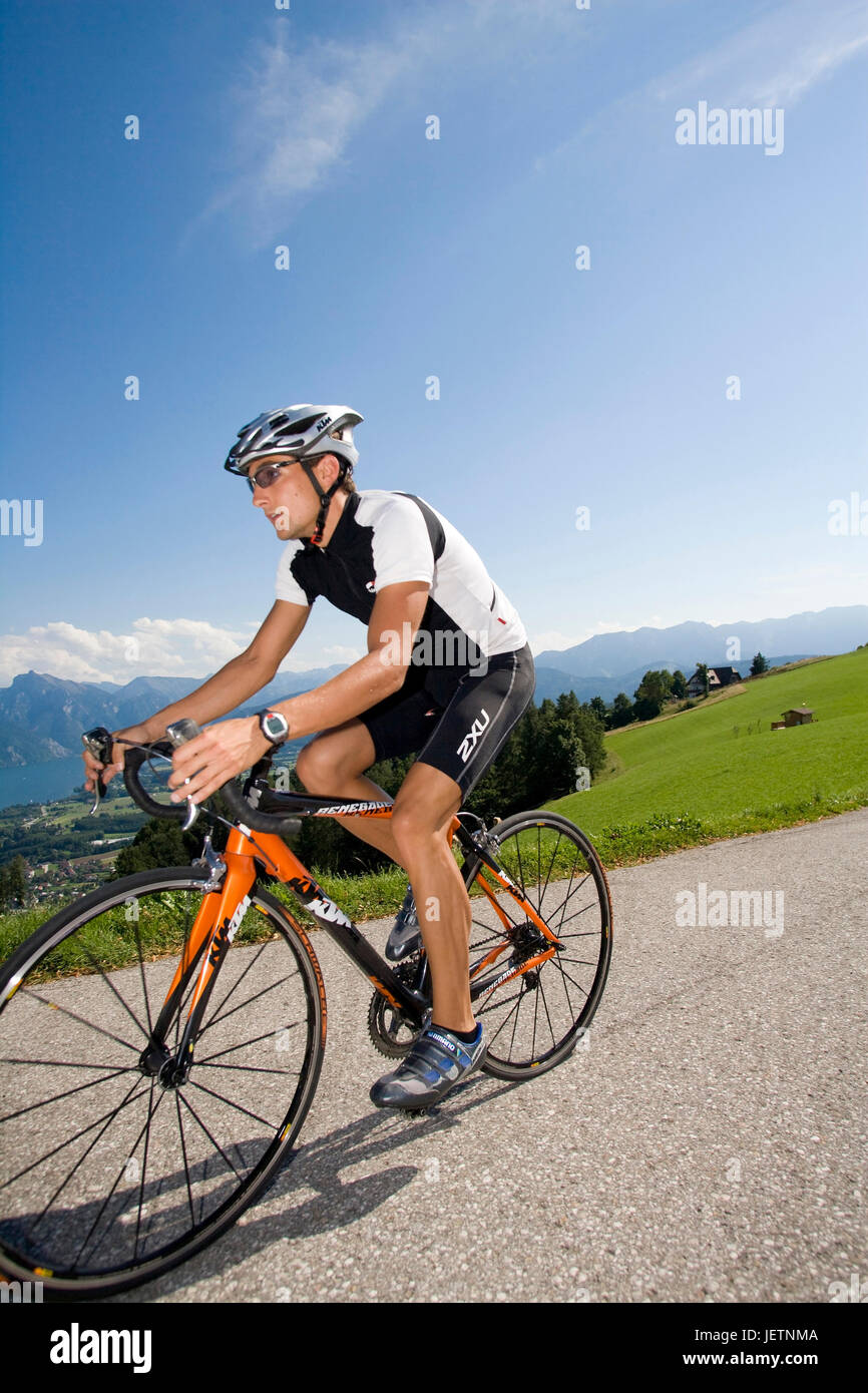 Man with the racing wheel in alpine scenery, Mann mit dem Rennrad in ...