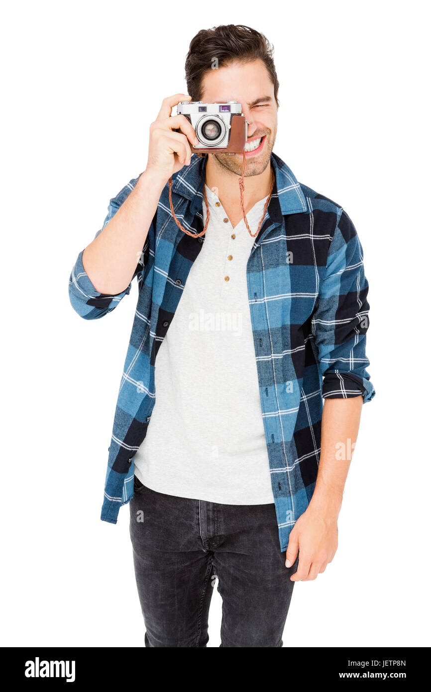 Man photographing with camera Stock Photo - Alamy