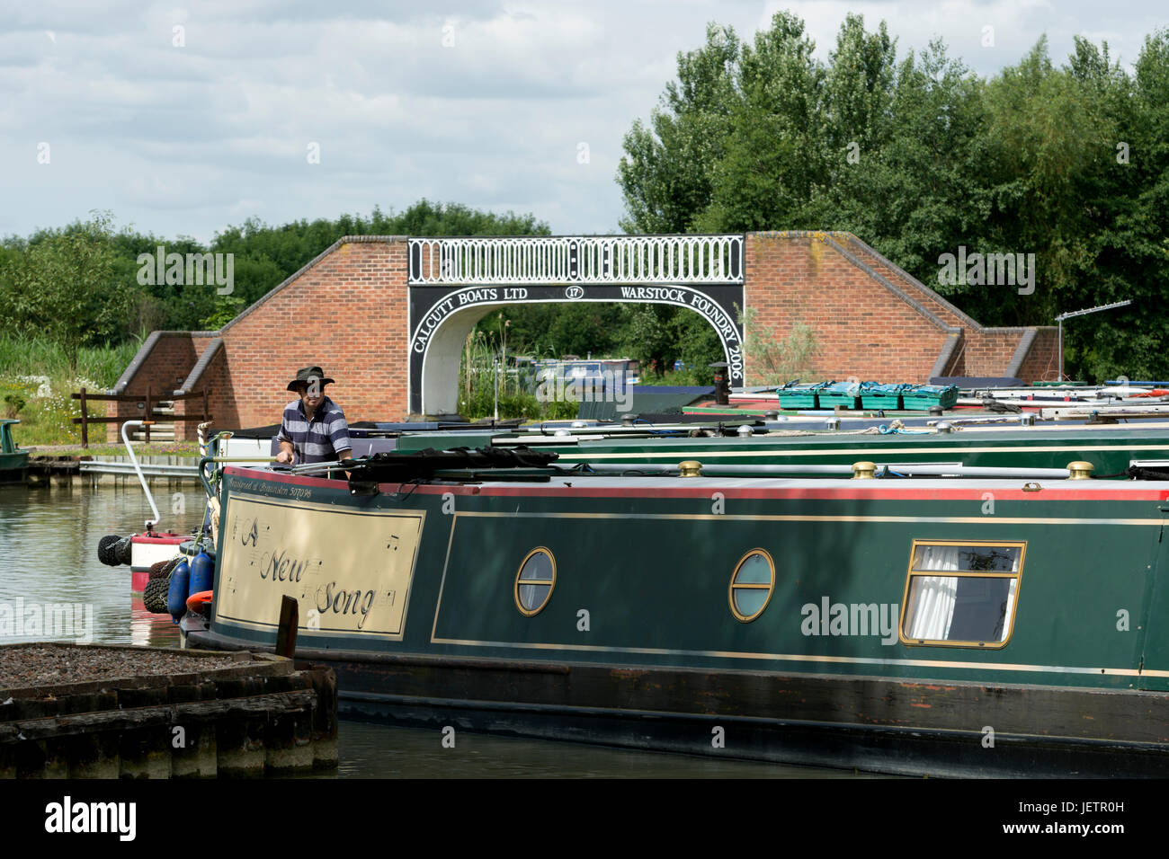 A narrowboat leaving Calcutt Marina on the Grand Union Canal ...