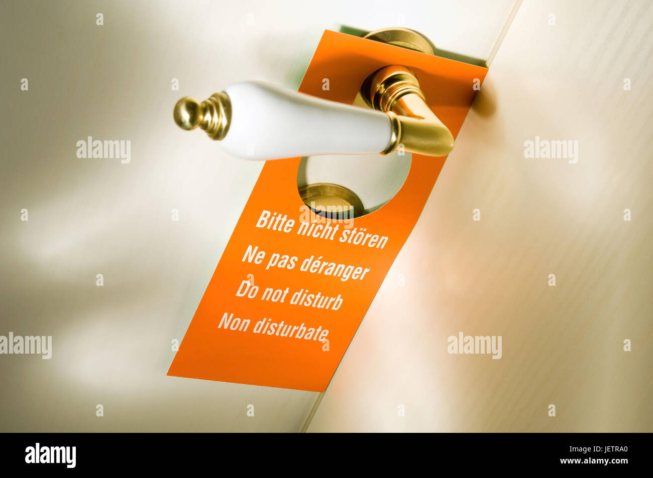 "Sign ""Request do not interfere"" in a white hotel room door with ...