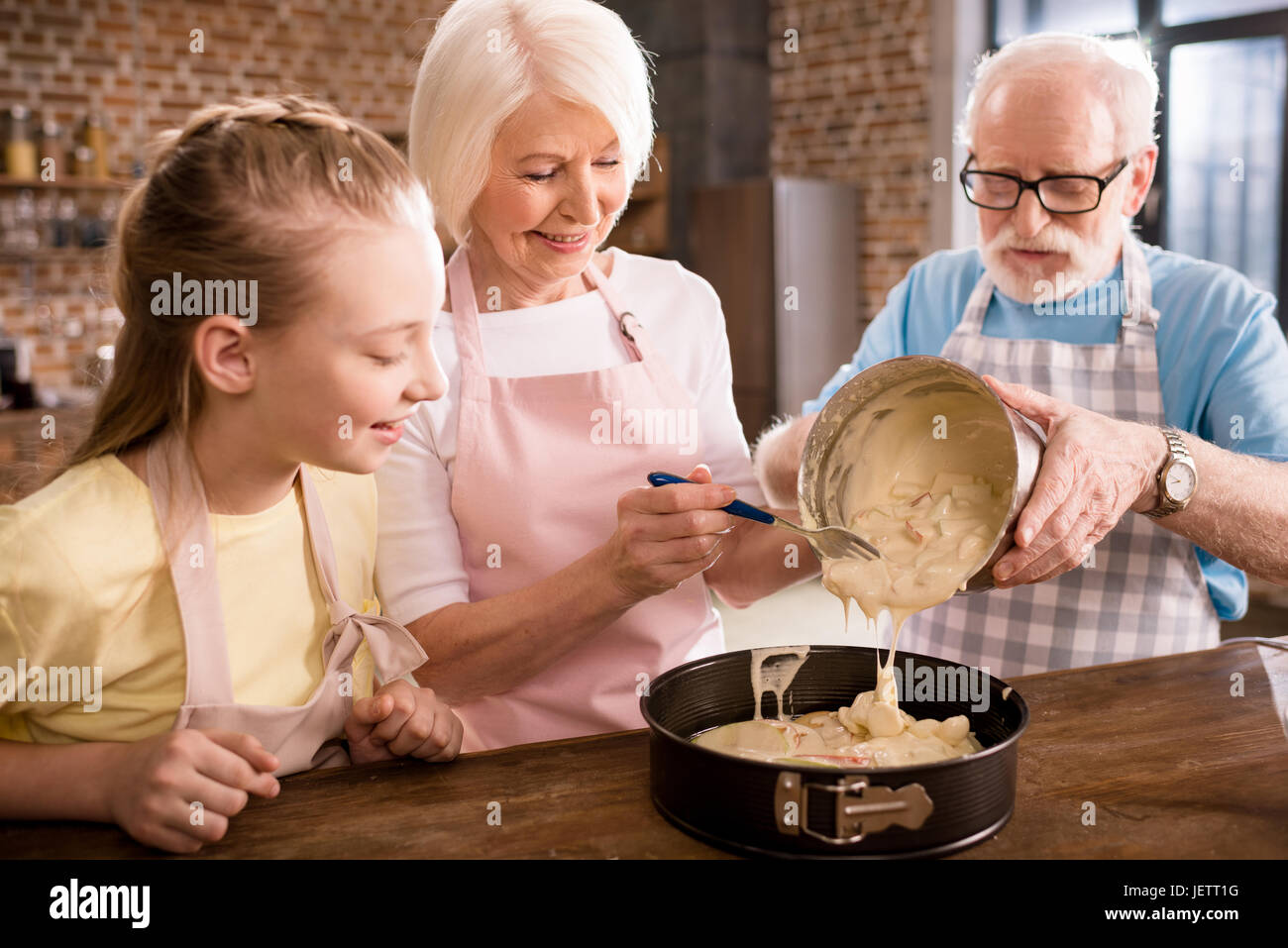 happy grandparents and girl cooking together at home Stock Photo - Alamy