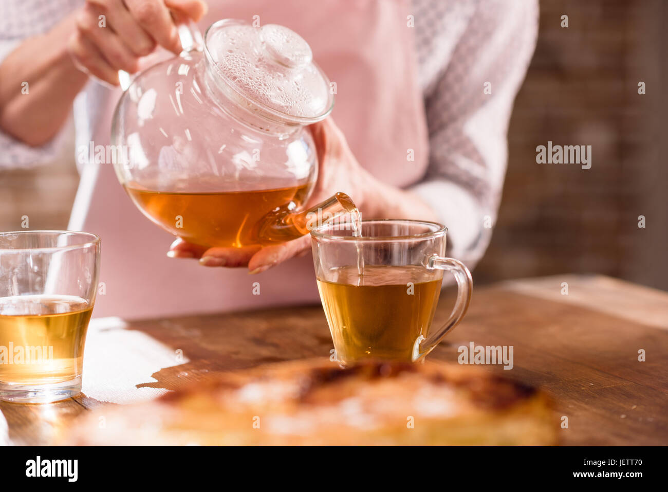 Pouring hot tea in cup hi-res stock photography and images - Alamy