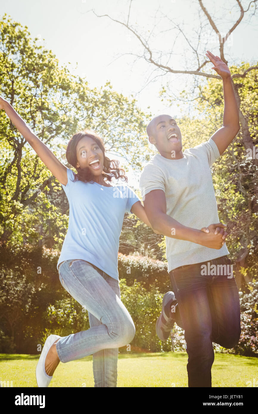 Young couple having fun and dancing Stock Photo - Alamy