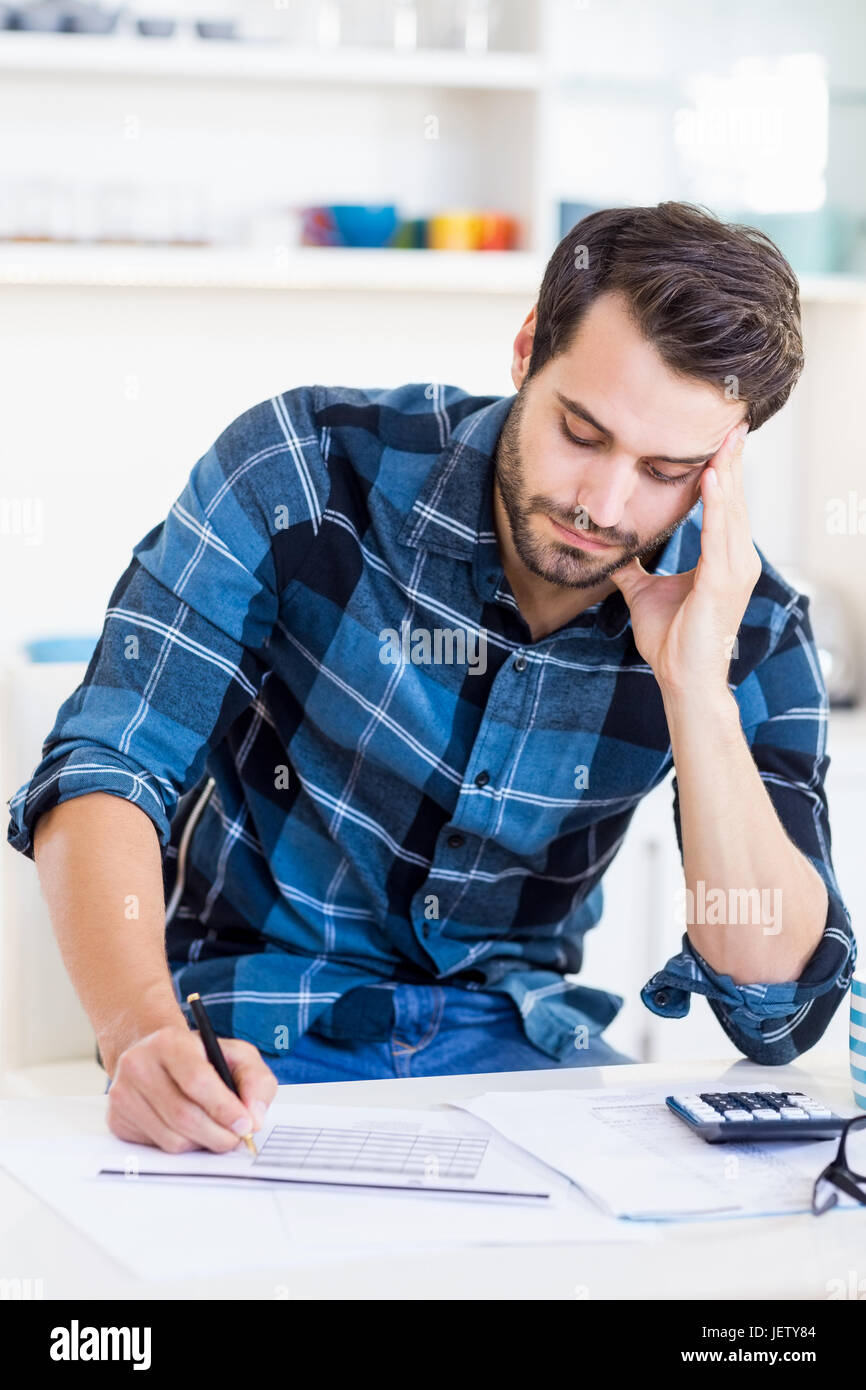 A man is concentrating on his notes Stock Photo - Alamy