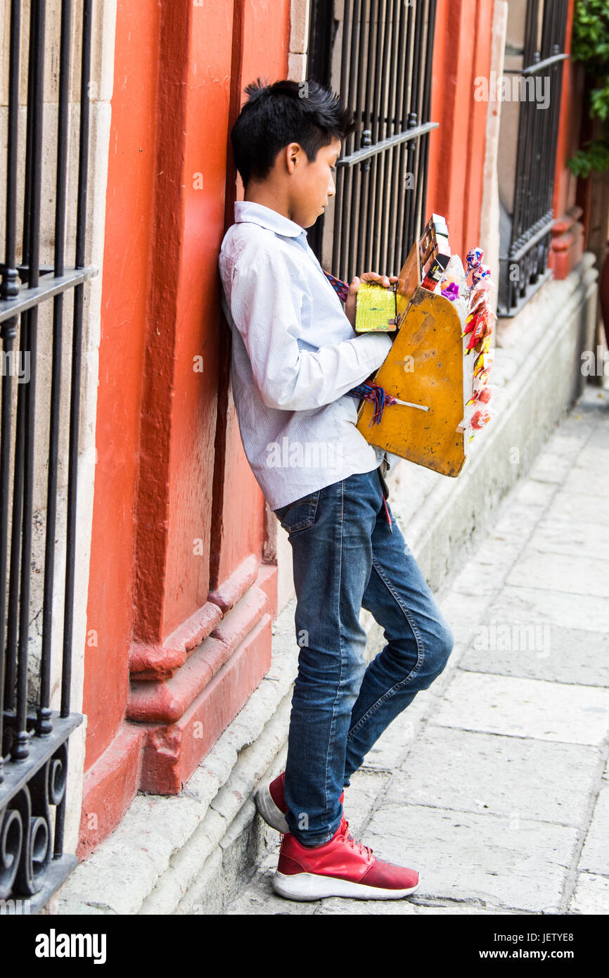 Boy selling candy on the street in Oaxaca, Mexico Stock Photo - Alamy