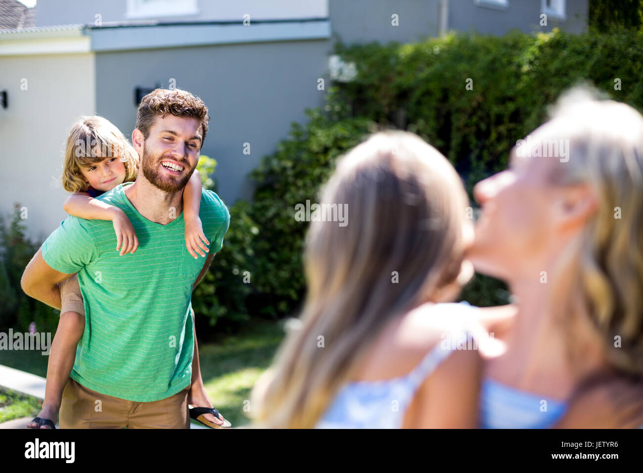 Carrying children hi-res stock photography and images - Alamy