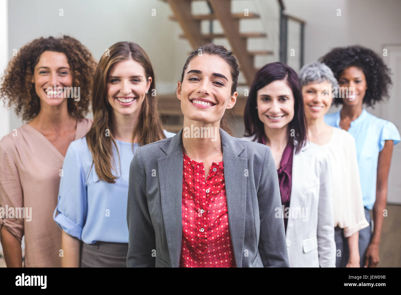 Group of interior designer standing together Stock Photo - Alamy