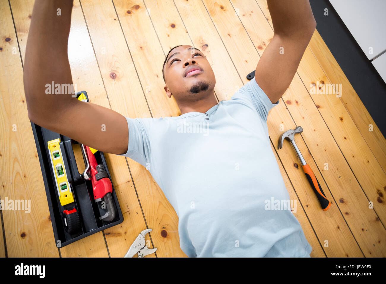 Man working with a set of tools Stock Photo - Alamy