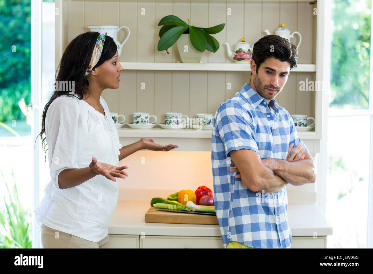 Young couple into an argument Stock Photo - Alamy