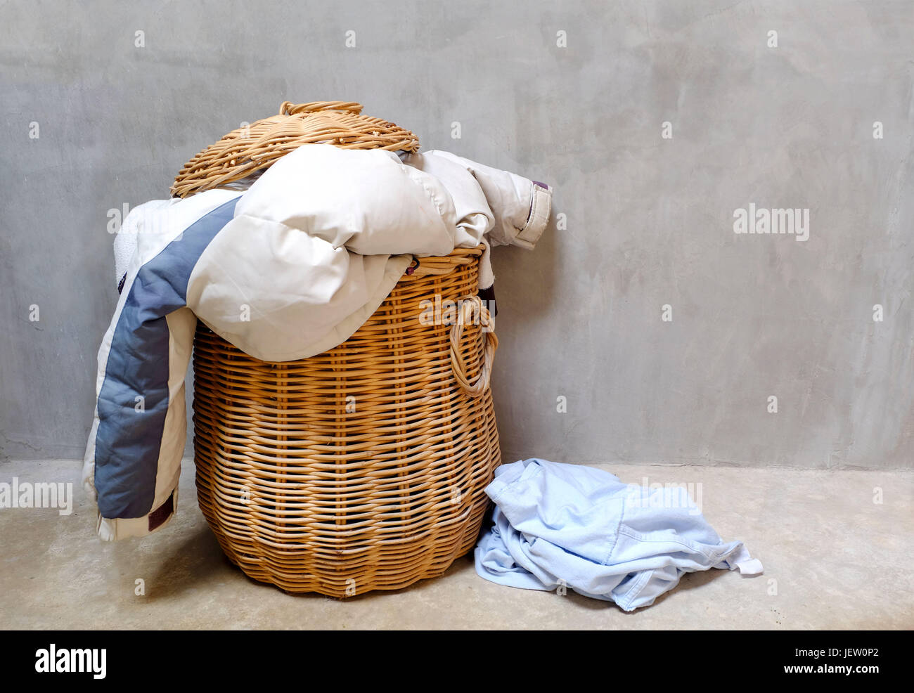 Overflowing laundry basket hi-res stock photography and images - Alamy