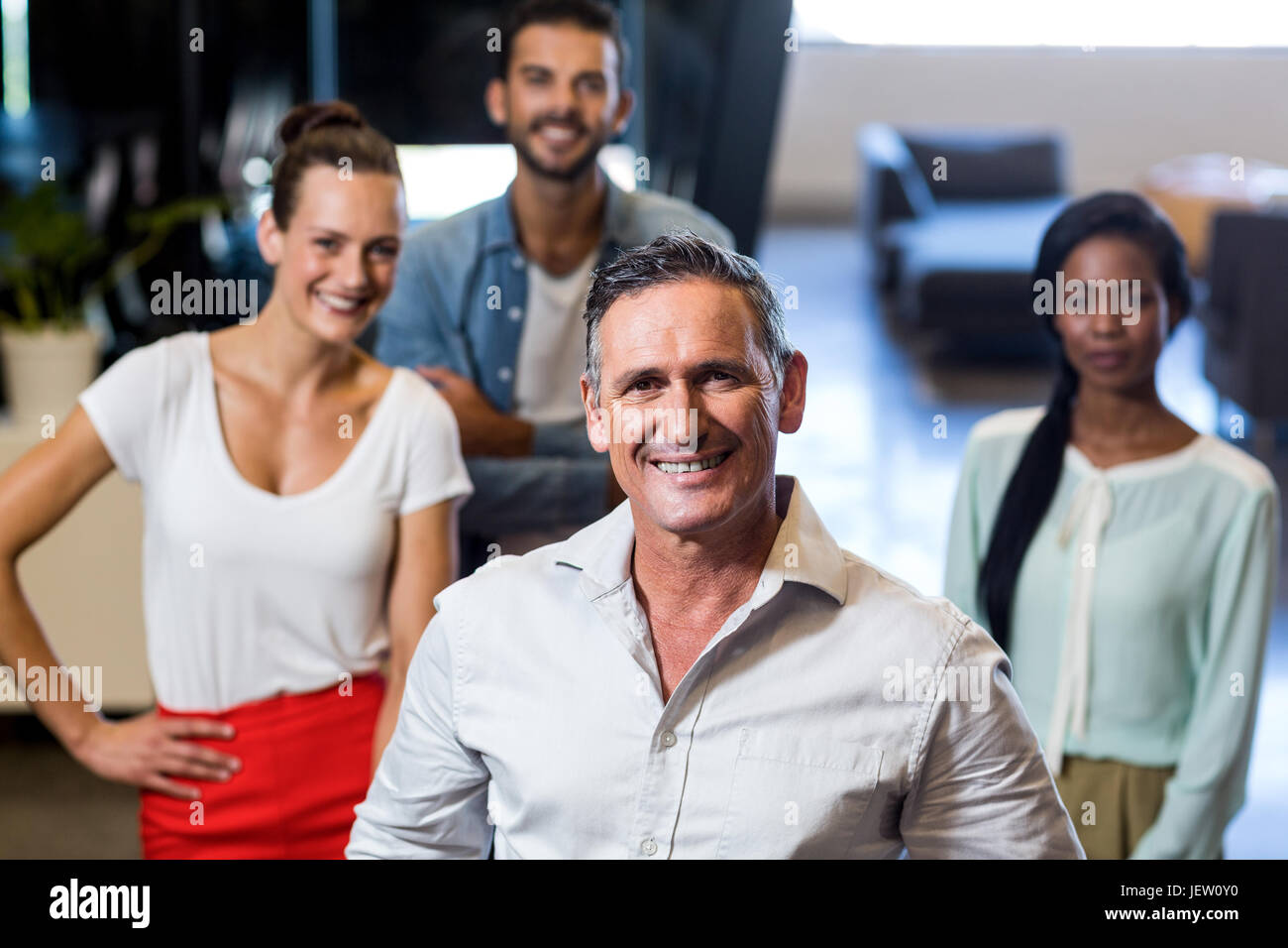 Colleagues posing together Stock Photo - Alamy