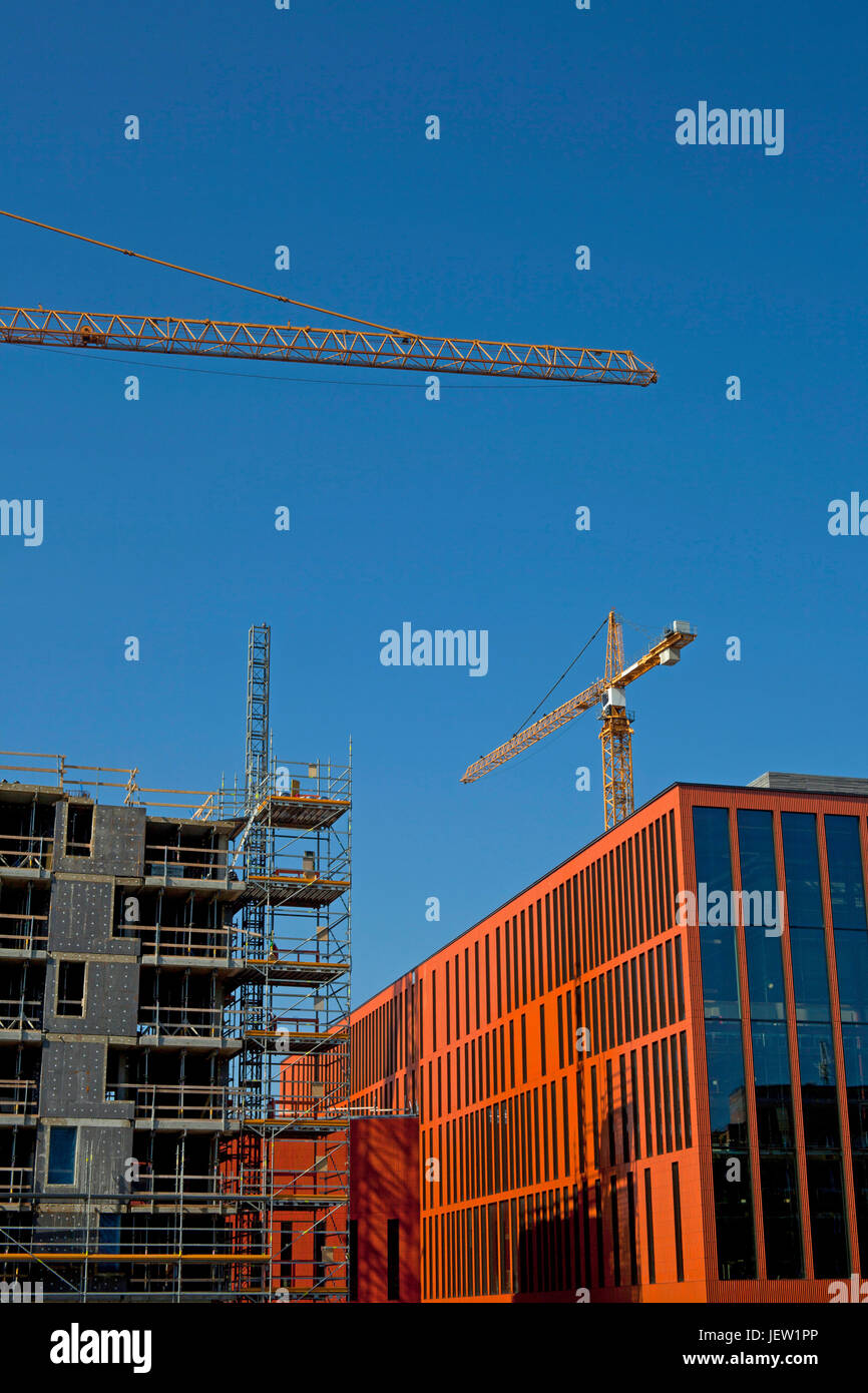 Modern buildings on construction with cranes in Malmo, Sweden Stock ...