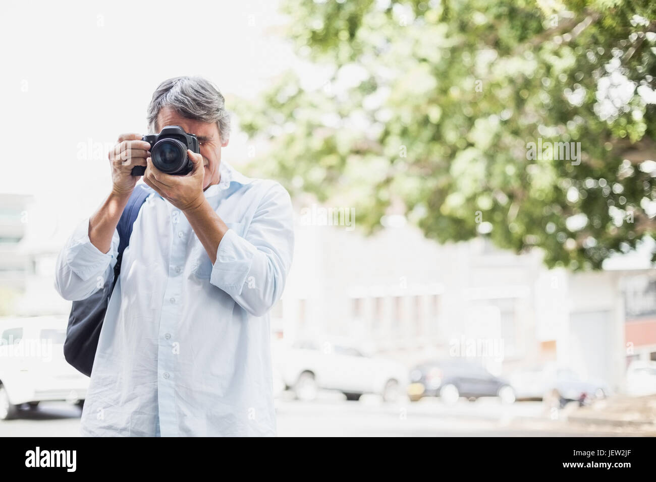 Front view of man looking into camera Stock Photo - Alamy