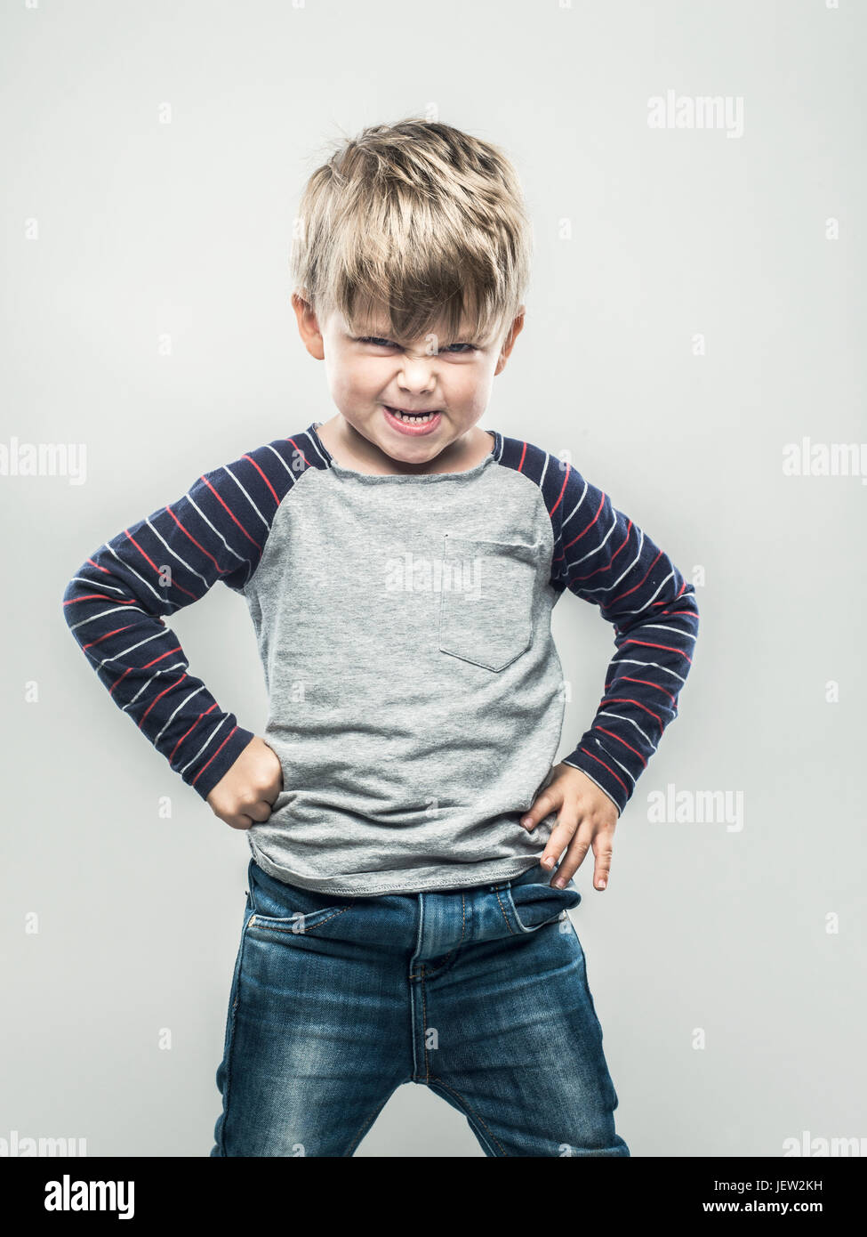 Portrait of angry boy Stock Photo - Alamy
