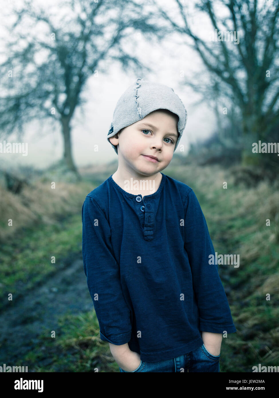 Portrait of boy wearing hat Stock Photo - Alamy