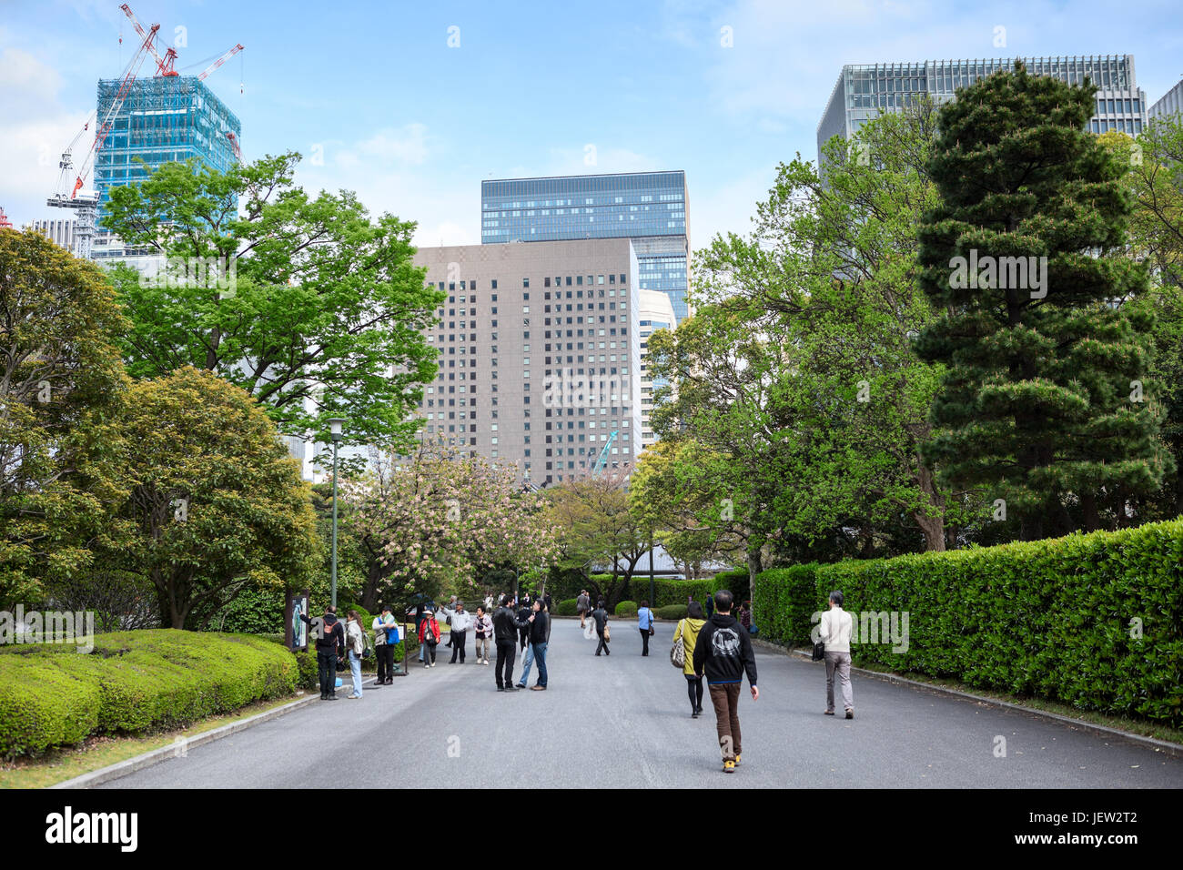 TOKYO, JAPAN - CIRCA APR, 2013: Visitors walk pathways in the East ...