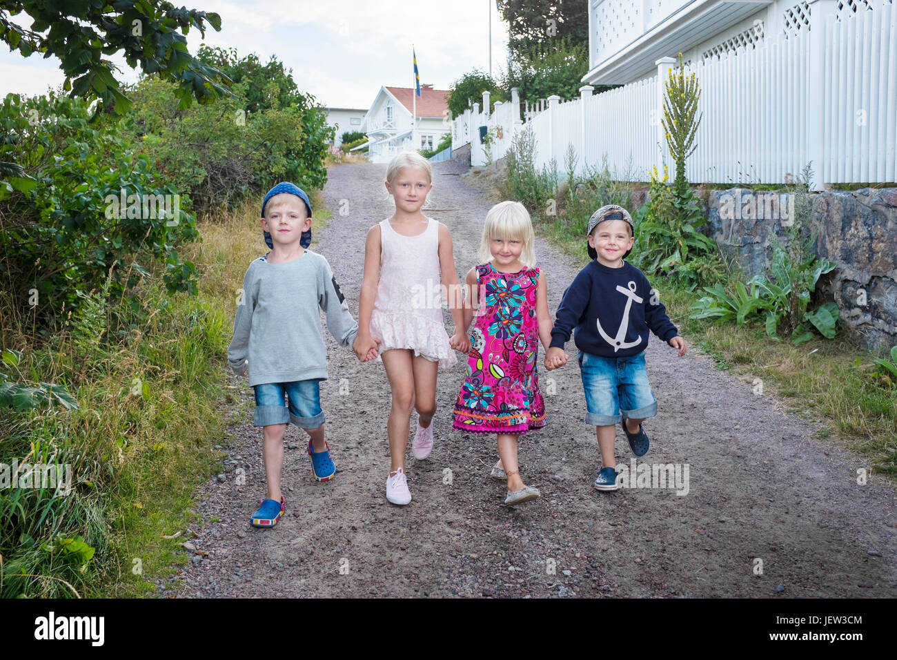 Children walking together Stock Photo - Alamy