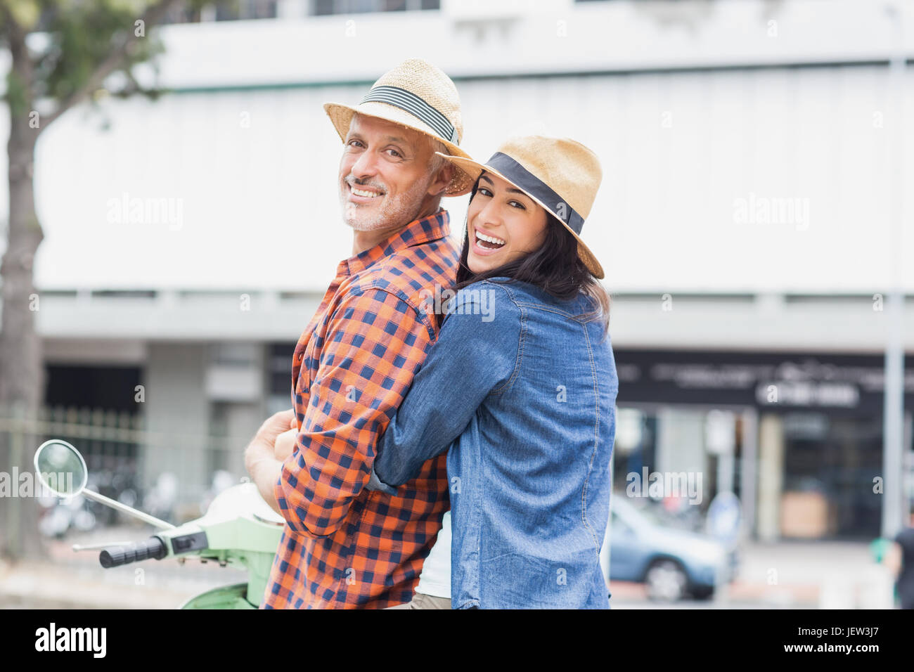 Portrait of happy woman embracing man Stock Photo - Alamy