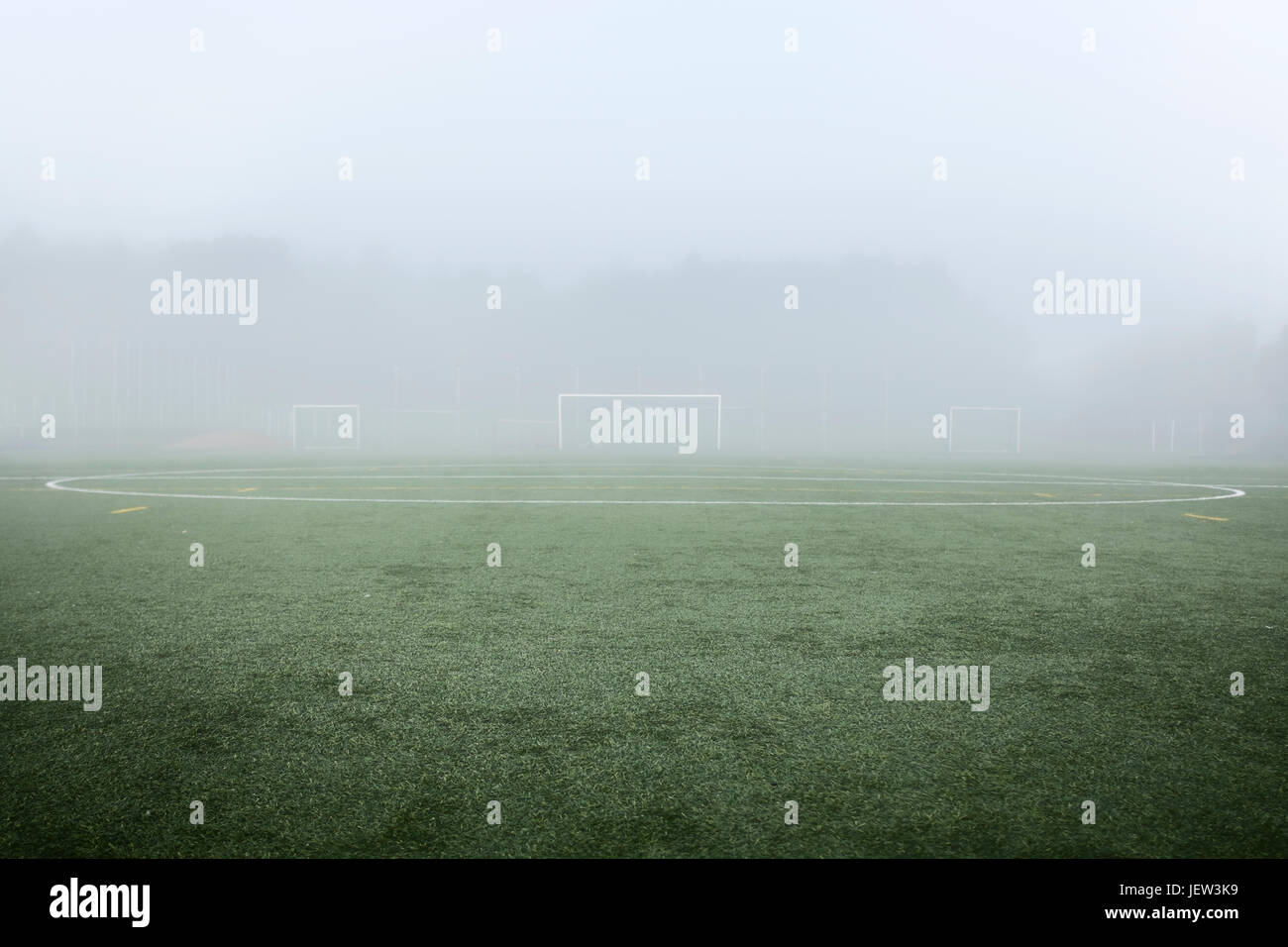Playing field in fog Stock Photo - Alamy