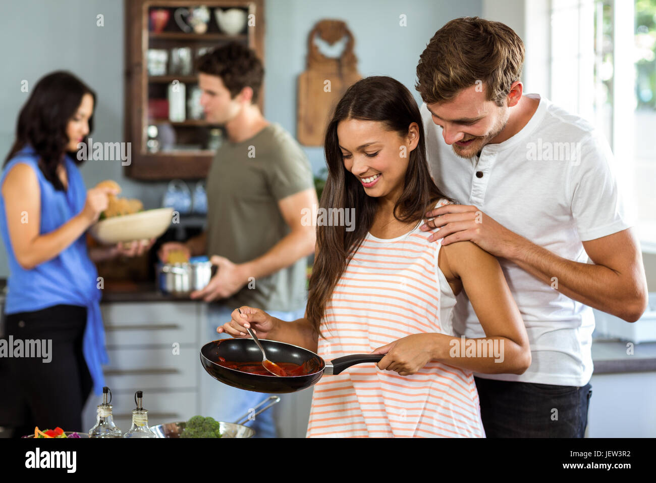 Romantic couple cooking hi-res stock photography and images - Alamy