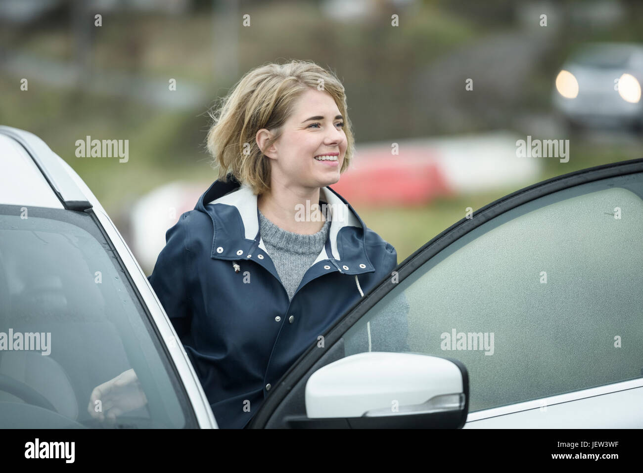 Young woman driver near car hi-res stock photography and images - Alamy