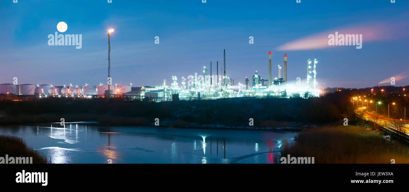 Illuminated factory at night Stock Photo - Alamy