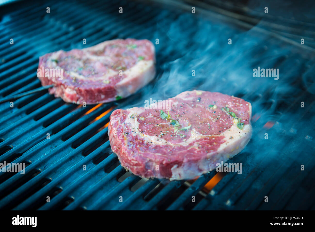 Meat on grill Stock Photo - Alamy