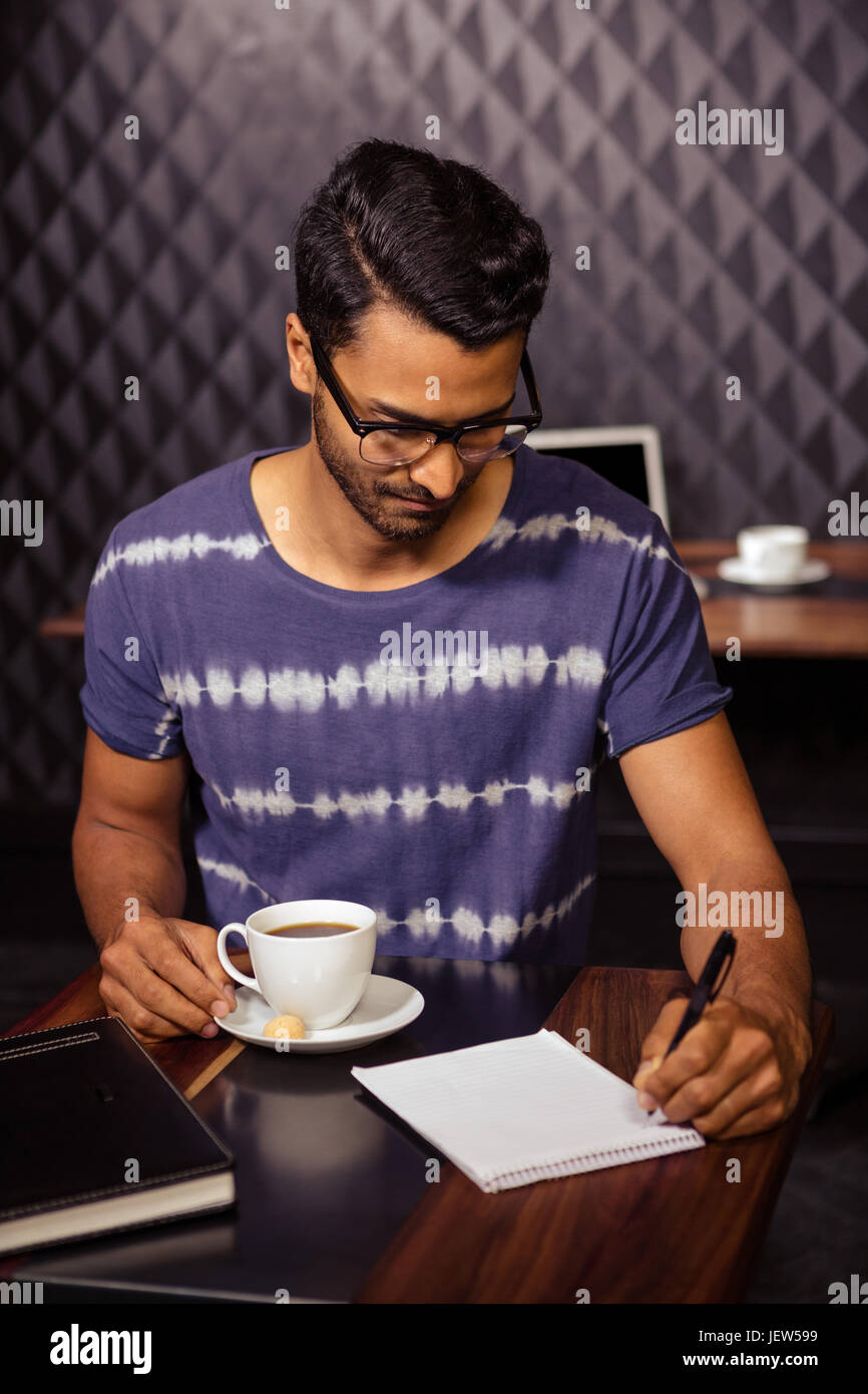 Man taking notes Stock Photo - Alamy
