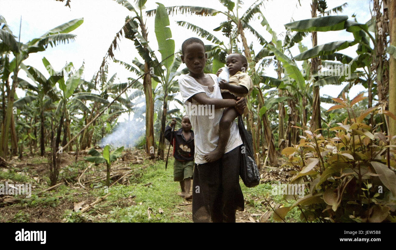 FOOD EVOLUTION, boys walk from burning bananas, 2016. © Abramorama ...