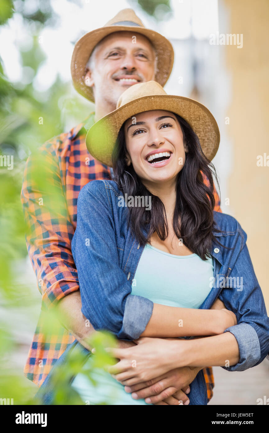 Romantic man embracing woman Stock Photo - Alamy