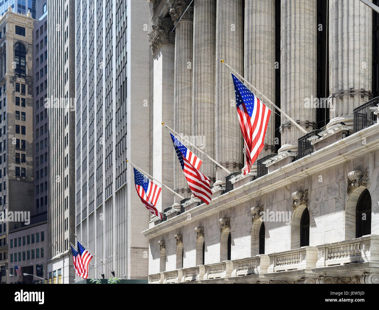 American flags on building Stock Photo - Alamy