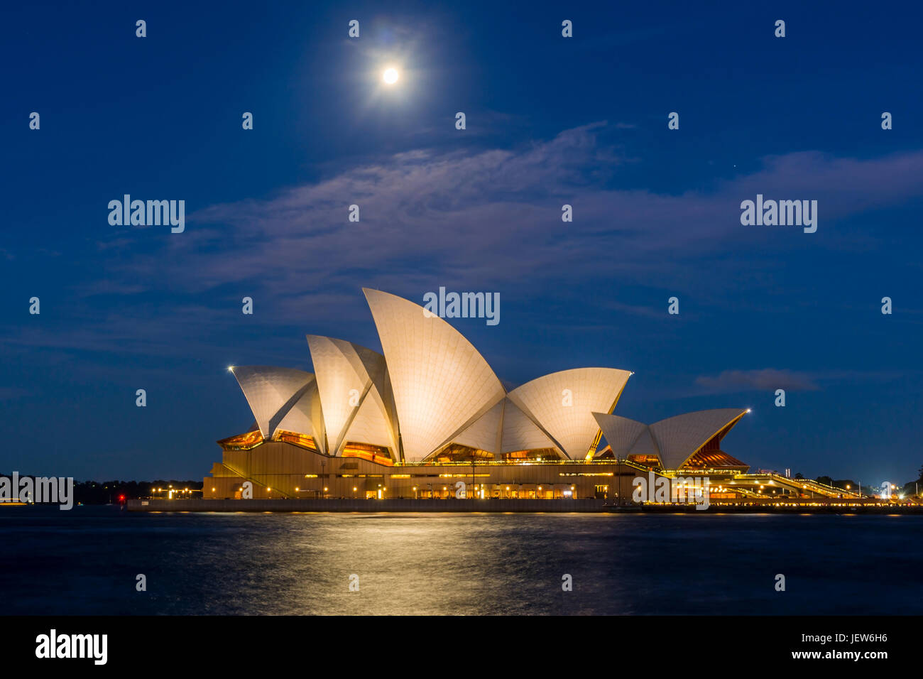 View on Sydney Opera house with moon at night, long exposure Stock ...