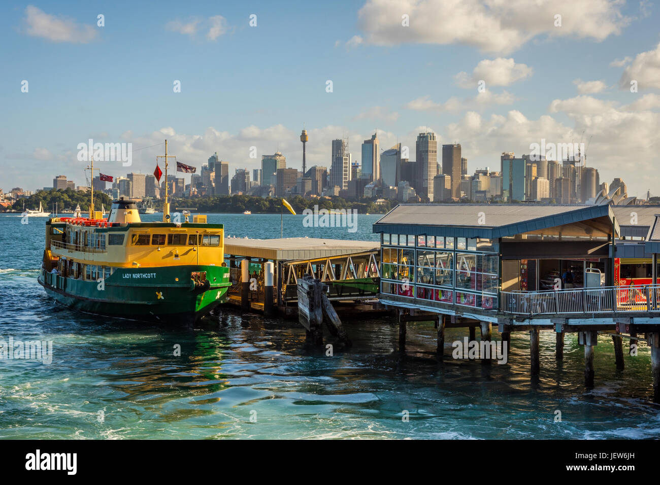 SYDNEY, AUSTRALIA - APRIL 24: Sydney skyline with old ferries, one of ...