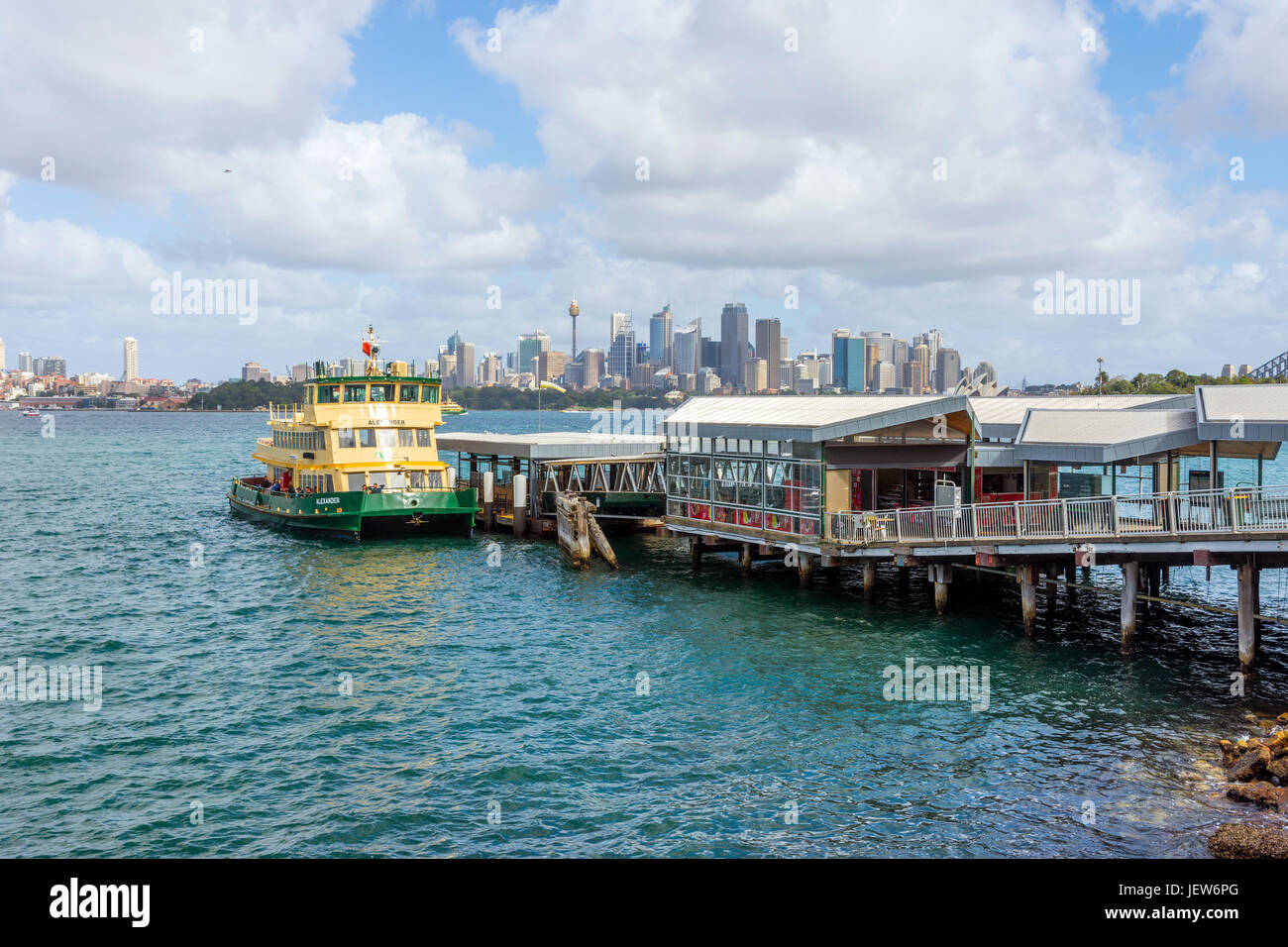 SYDNEY, AUSTRALIA - APRIL 24: Sydney skyline with old ferries, one of ...