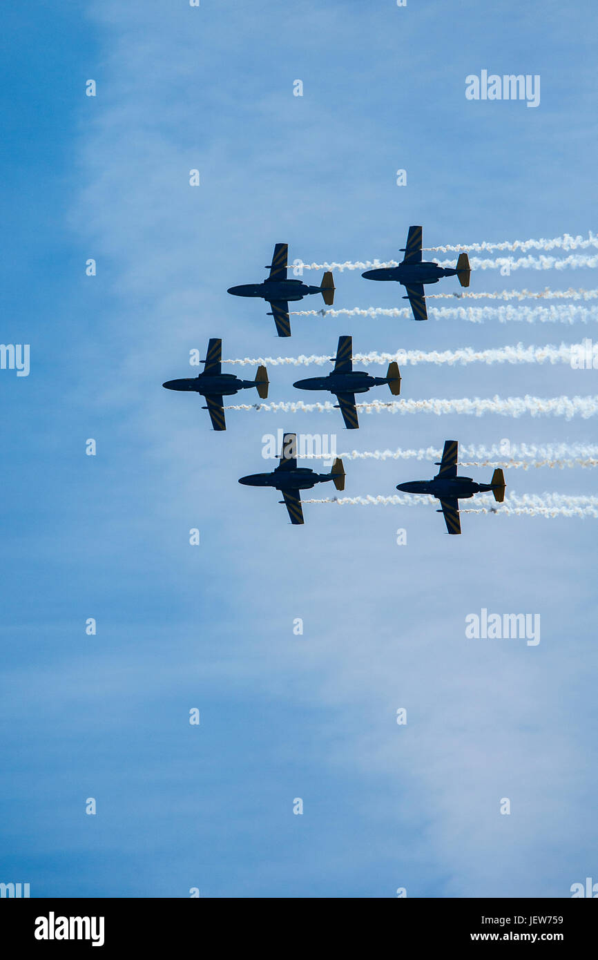 Planes formation on sky Stock Photo - Alamy