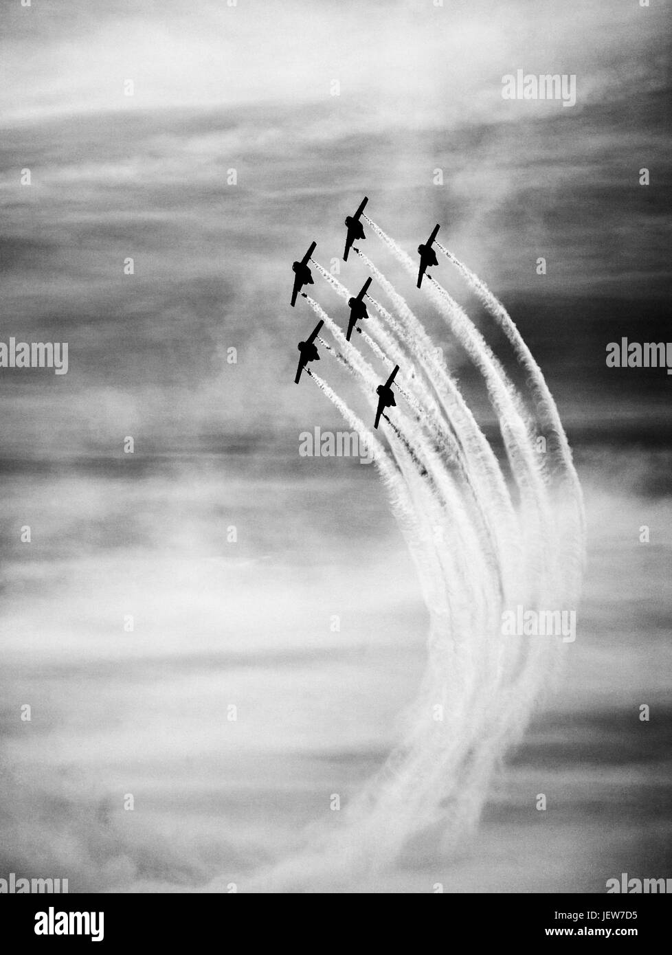Planes formation on sky Stock Photo - Alamy