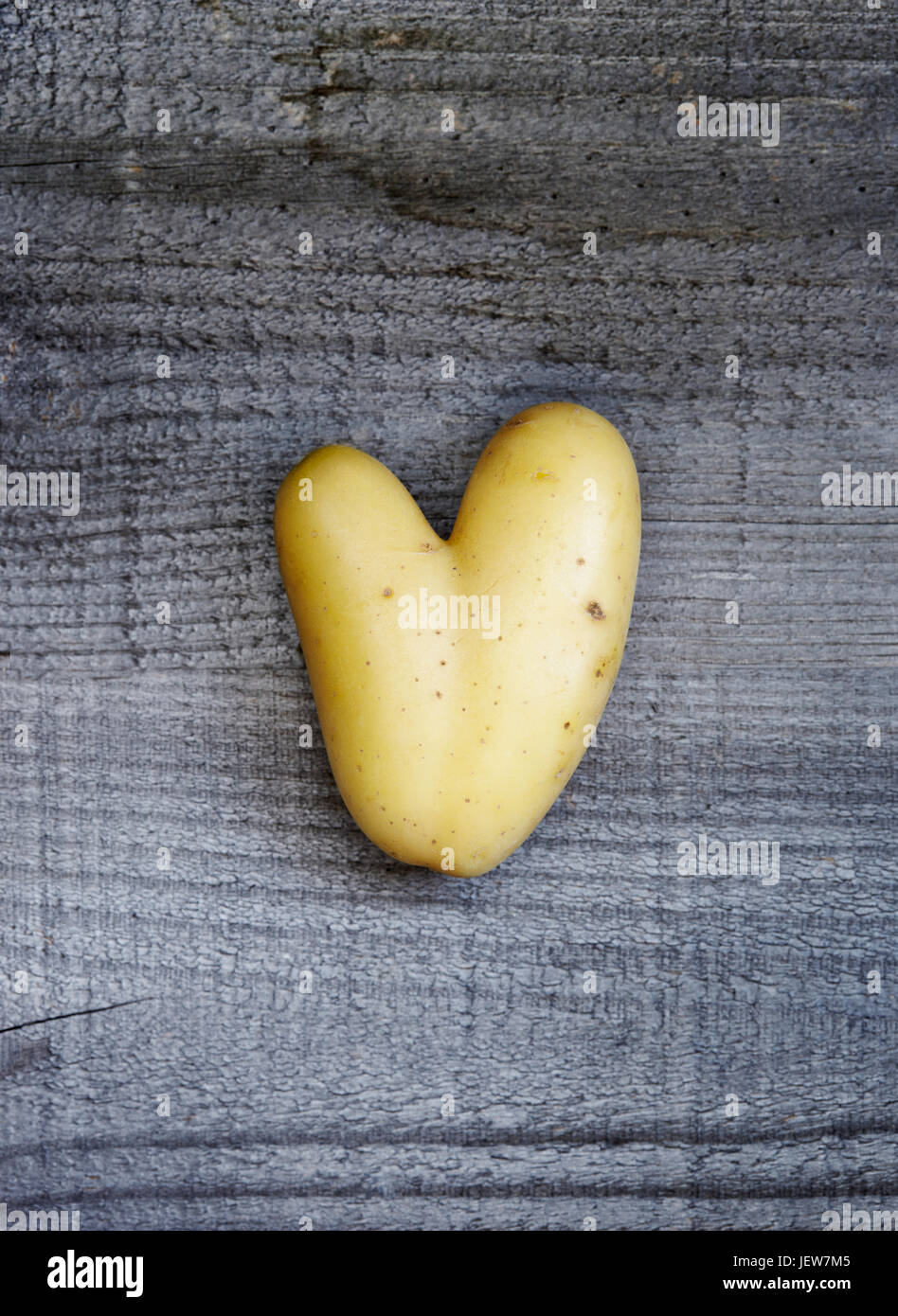 Potato in heart shape Stock Photo - Alamy