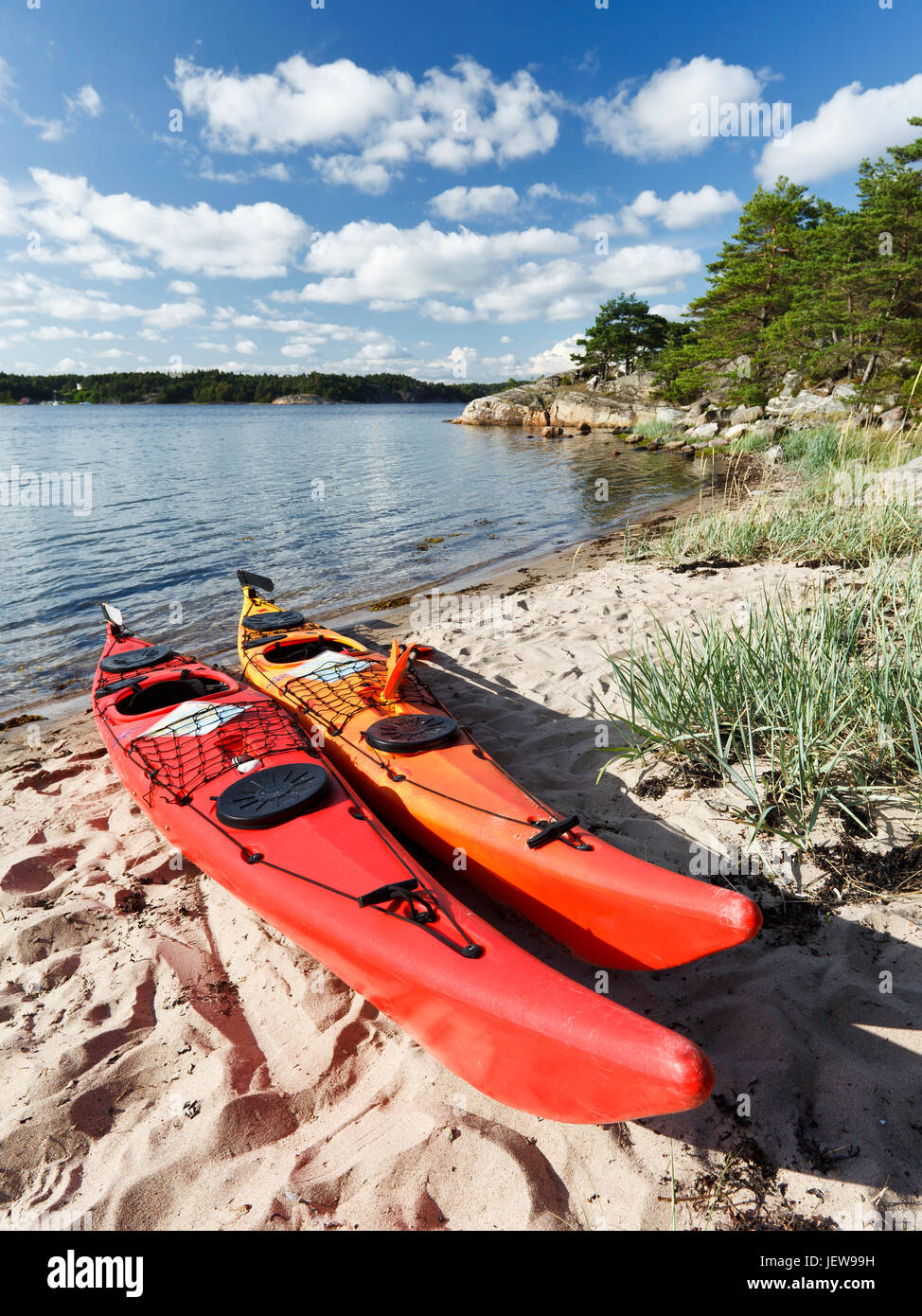 Canoes on sandy beach Stock Photo - Alamy