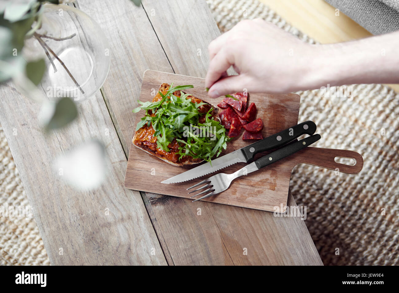 Hand putting rocket on hi-res stock photography and images - Alamy