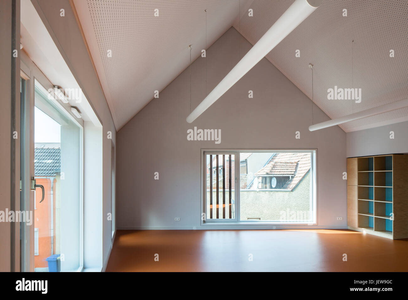 Group room with pitched ceiling and large fenestration. Kindergarten ...