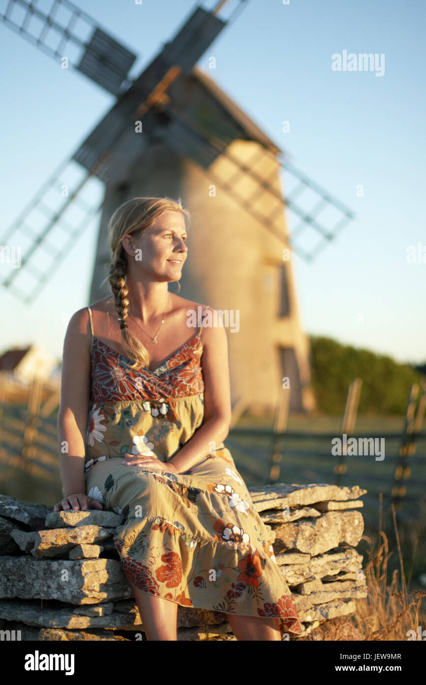 Woman and windmill hi-res stock photography and images - Alamy