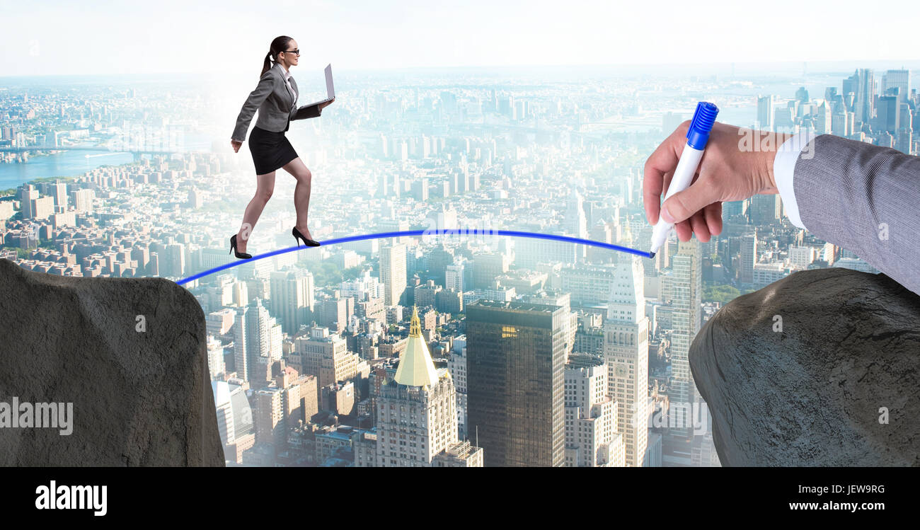 Hand drawing bridge under businesswoman Stock Photo - Alamy