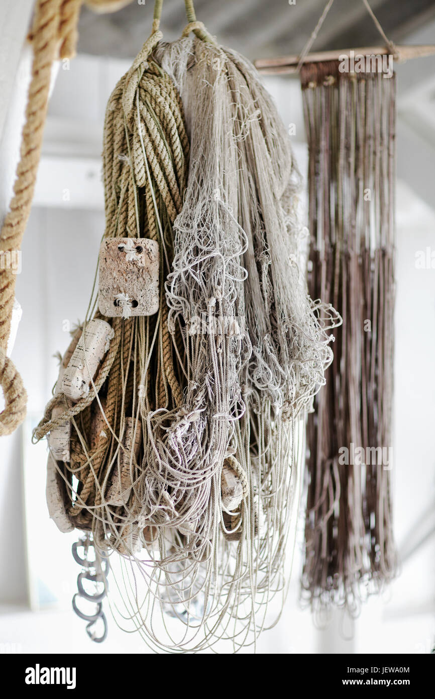 Fishing nets hanging Stock Photo - Alamy
