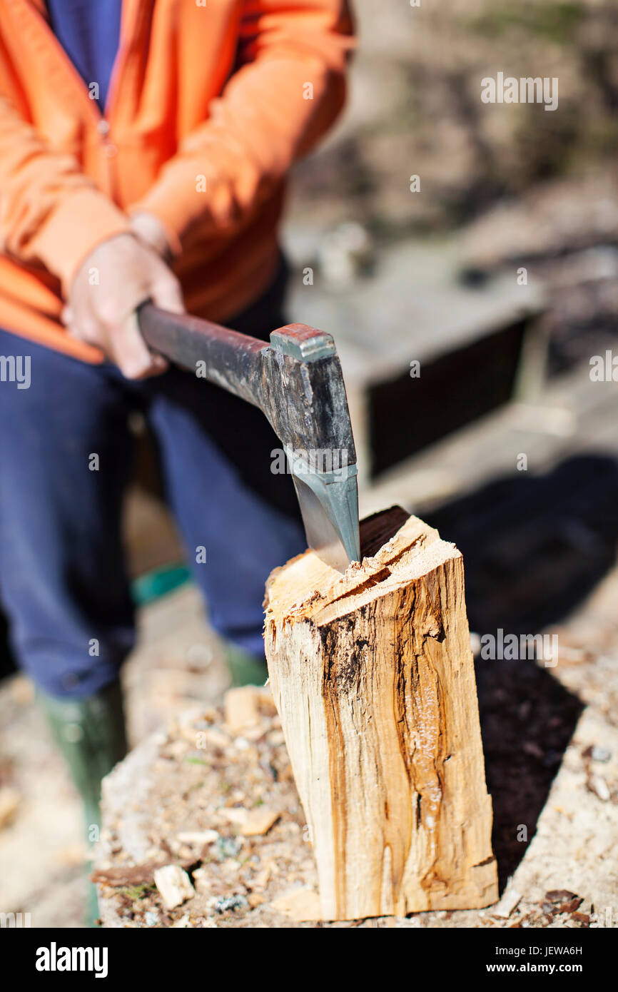 Man chopping wood Stock Photo - Alamy