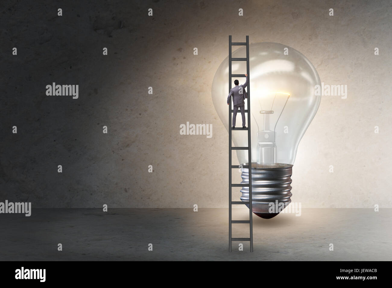 Businessman on ladder with light bulb Stock Photo - Alamy