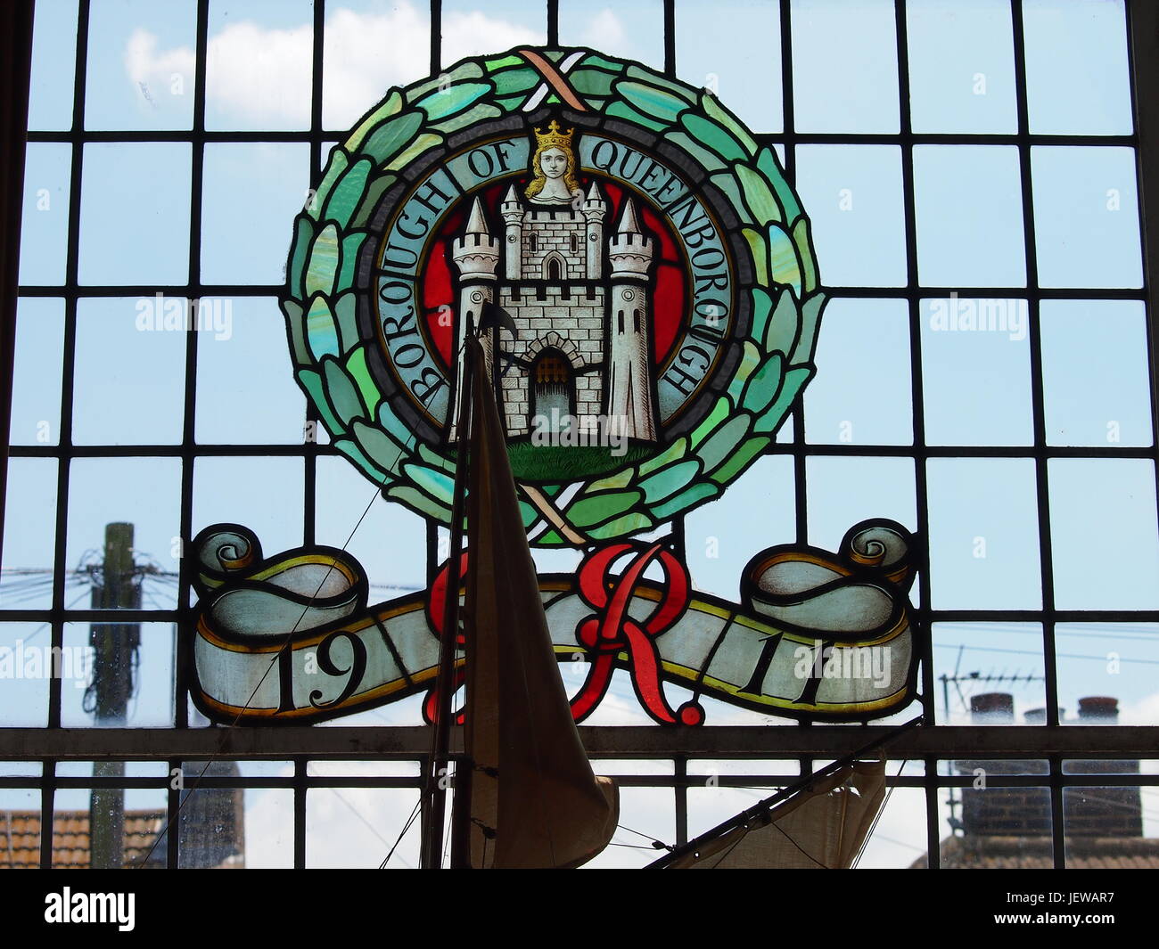 Queenborough Town Hall stain glass window Stock Photo - Alamy